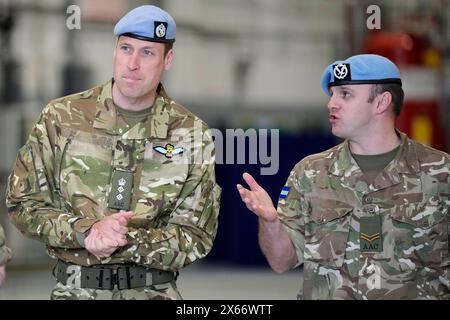 King Charles III speaks with Colonel Erica Bridge during a reception ...