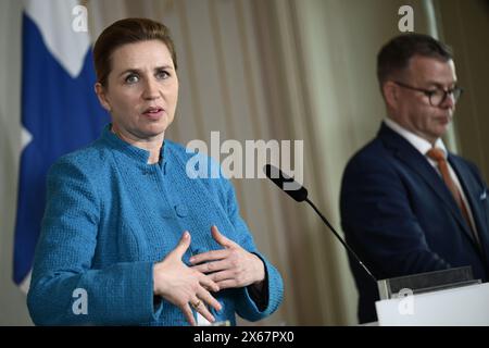 Finland's Prime Minister Petteri Orpo speaks with the media as he arrives for an EU summit at ...