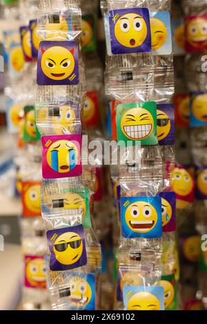 Sweets in plastic packaging with emojis Stock Photo - Alamy