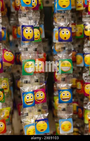 Sweets in plastic packaging with emojis Stock Photo - Alamy