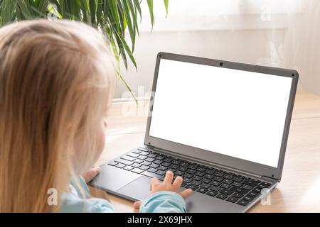 preschool girl studying distance learning course, using computer ...