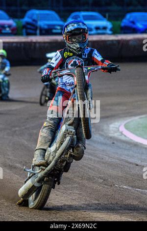 Belle Vue Aces' Ben Cook in Red leading Leicester Lions' Luke Becker in ...