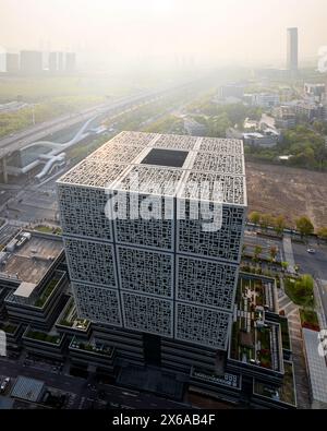 Drone flyover of the Cube Gallery at Vanke Xiaoshan in Hangzhou, China ...