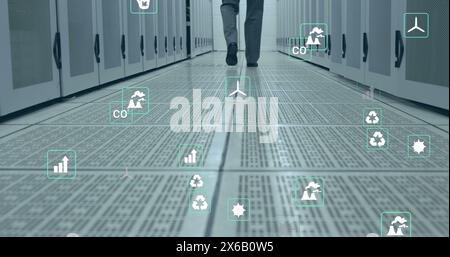 Image of falling icons over server room Stock Photo - Alamy