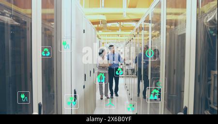 Image of falling icons over server room Stock Photo - Alamy