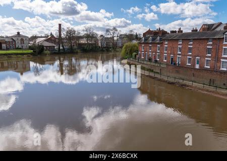 View along the River Severn towards the old stone bridge in the ...