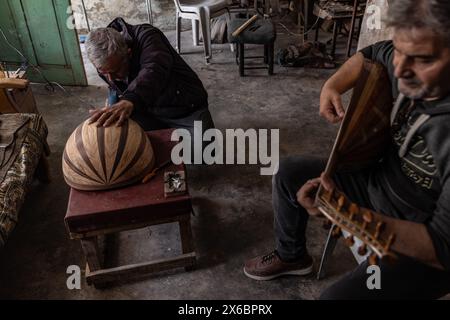Al Bab, Syria. 12th May, 2024. A man plays the oud instrument while ...