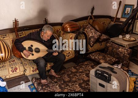 Al Bab, Syria. 12th May, 2024. A man plays the oud instrument while ...