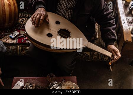 Al Bab, Syria. 12th May, 2024. A man plays the oud instrument while ...