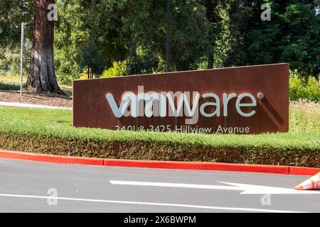 A logo sign at the headquarters of VMware, Inc., in Palo Alto ...