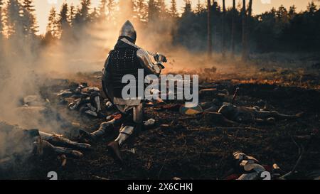 Medieval Knight Walking on Battlefield amidst Dead Enemies. Last ...