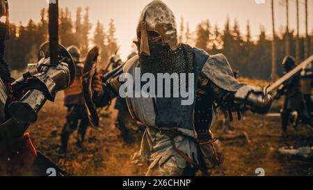 Epic Battlefield: Two Armored Medieval Knights Fighting with Swords. Dark Ages Army Warfare ...