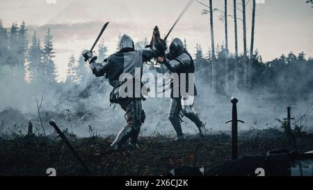 Epic Battlefield: Two Armored Medieval Knights Fighting with Swords. Dark Ages Army Warfare ...