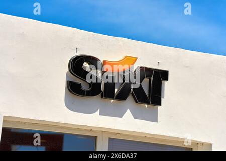 Santorini, Greece - 8 May 2024: SIXT car rental company logo on a ...