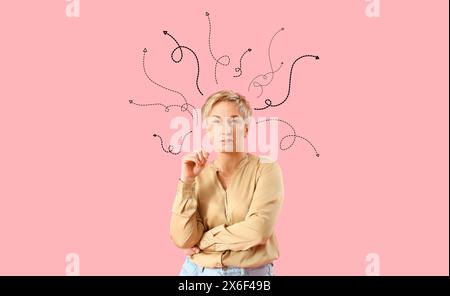 Thoughtful mature woman on pink background Stock Photo - Alamy