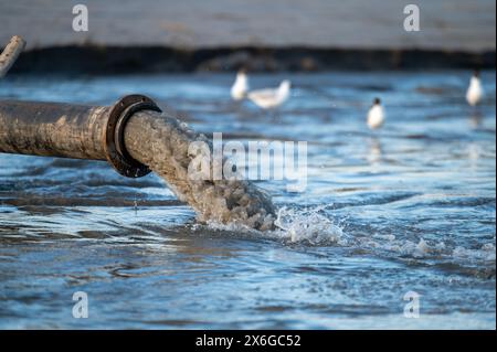 Beach restoration using a sand transfer system in Engure, Latvia Stock ...