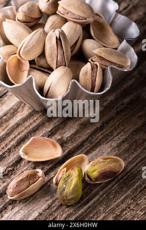 Roasted and Salted Pistachios without Shells on a Wood Table Stock ...