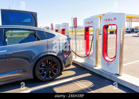 White Hills, Arizona - April 14, 2024: Tesla Vehicle Replenishes Its ...
