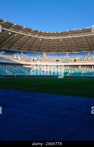 A view of the stands, seats, an oval around the field, pitch. At the ...