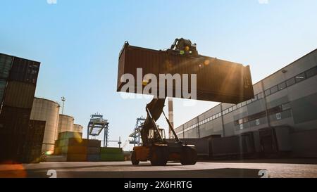 Modern Container Handler Carrying a Large Red Steel Shipping Cargo ...