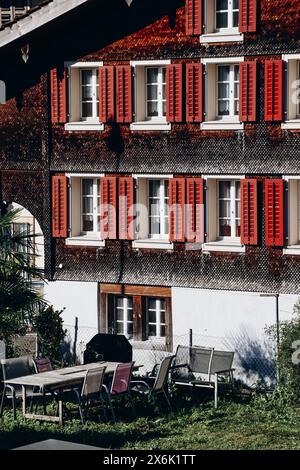 Beautiful facades of the Swiss Alpnachstad Stock Photo - Alamy
