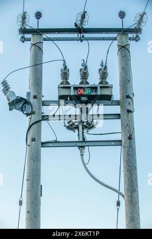 Electric transformer pole with “ON” and “OFF” markings—highlighting ...