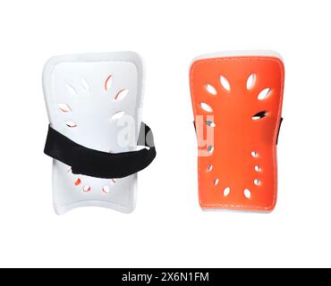 orange shin guards pair isolated on white background Stock Photo - Alamy