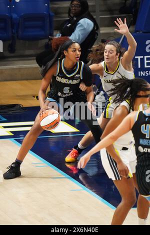 Chicago Sky forward Angel Reese (5) is defended by Dallas Wings center ...