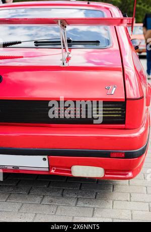 A shiny red Ford Capri car parked outside Stock Photo - Alamy