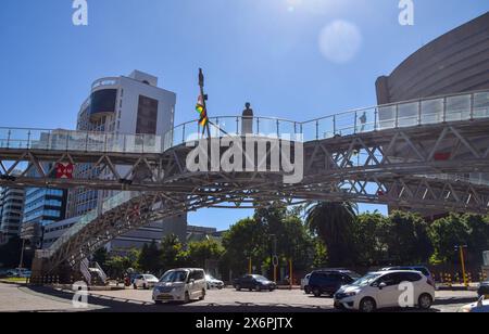Harare, Zimbabwe, 21st April 2024: Pedestrian bridge with the statue of ...