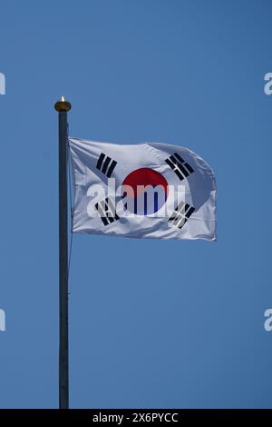 Flag of South Korea waving in the wind against a blue sky Stock Photo ...