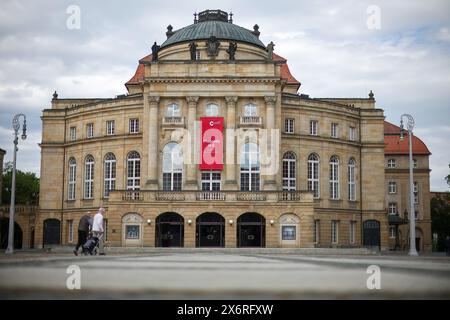 Chemnitz, Germany. 16th May, 2024. Passers-by walk across Theaterplatz ...