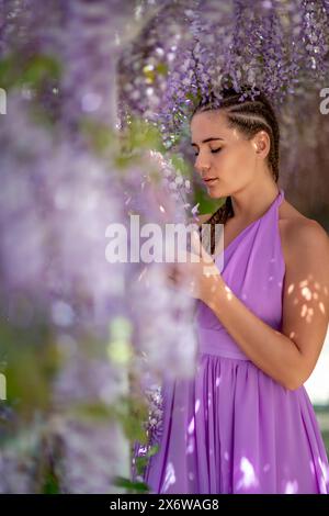 Woman Wisteria Lilac Dress Thoughtful Happy Mature Woman In Purple