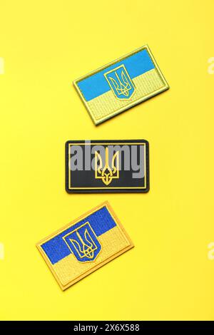 Different military badges of Ukrainian army with trident on yellow ...