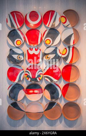 The Sichuan opera mask made out of colorful plates in Chongqing, China ...