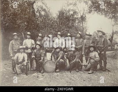 Group portrait of unknown KNIL soldiers of the Eleventh Battalion with ...