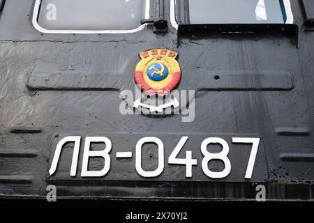 Detail of an old Soviet crest, symbol, medallion with hammer and wrench ...