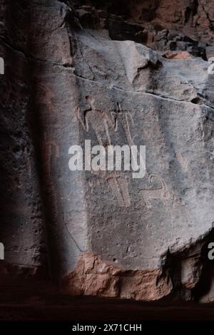 Ancient rock drawings at Wadi Rum, Jordan Stock Photo - Alamy