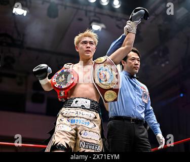 Tokyo, Japan. 16th May, 2024. Jin Sasaki (black gloves) of Japan and Joe Noynay of the ...