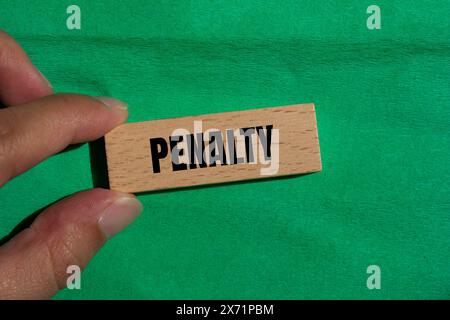 PENALTY text written on green wooden frame school blackboard Stock ...