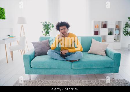 Full size photo of unsatisfied young girl standing hold cushion blanket ...