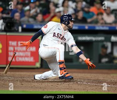 Houston Astros' Victor Caratini hits a single against the Seattle ...