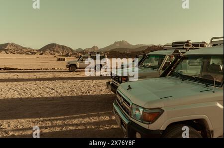 Tourists Safari Touring Jeeps In Desert Landscape Stock Photo - Alamy