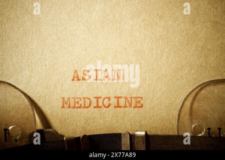Holistic medicine text written with a typewriter Stock Photo - Alamy