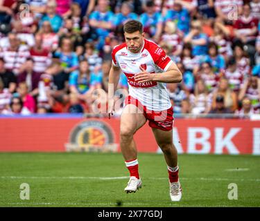 Doncaster, UK. 18th May, 2024. Jodie Cunningham of St Helens is tackled ...