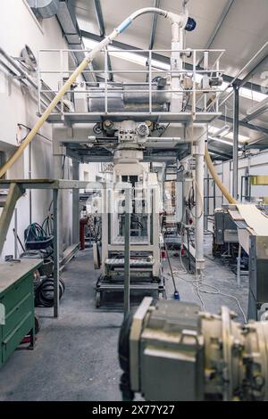 Industrial machine on factory floor Stock Photo - Alamy