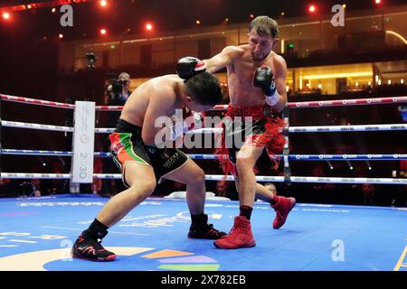 Isaac Lowe (right) in action against Hasibullah Ahmadi in their ...