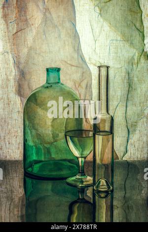 Still life with glassware and transparent cloth Stock Photo - Alamy