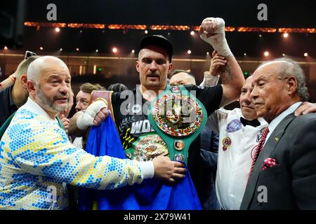 Oleksandr Usyk celebrates with the Undisputed Heavyweight title belt ...