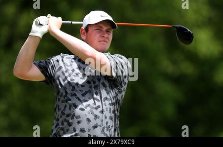 Robert MacIntyre of Scotland hits a shot from a bunker on the 9th hole ...
